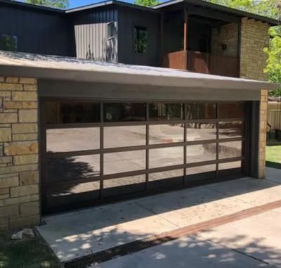 China Water Tightness Class 3 Transparent Glass Excellent Wind Resistance Industrial Overhead Sturdy Sectional Garage Door with Manual or Automatic for sale