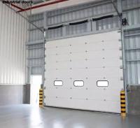 China 50mm-80mm Thickness Modern Steel Automatic Sliding Windproof Remote Control Commercial Insulated Sectional Garage Door in Powder Coated Finish for sale