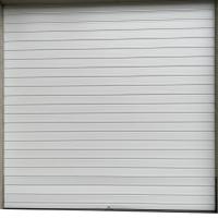 China Customized White Overhead Door 50mm-80mm Thickness Insulated Commercial Industrial Sectional Garage Door Remote Control Efficient Warehouse Operations for sale