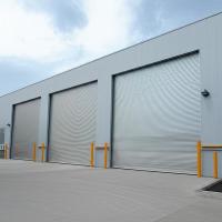 China Manual commercial sectional overhead doors foam filled Fire Station Industrial Sectional Doors Sectional Steel Doors Automatic Formed for sale