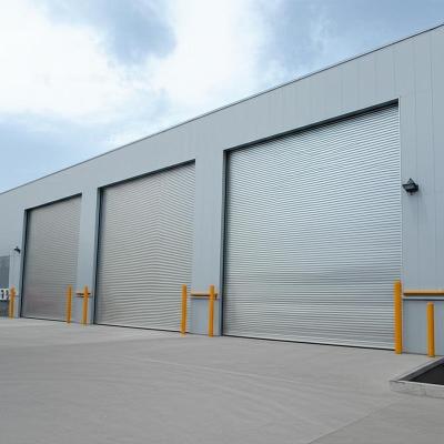 China Manual commercial sectional overhead doors foam filled Fire Station Industrial Sectional Doors Sectional Steel Doors Automatic Formed for sale