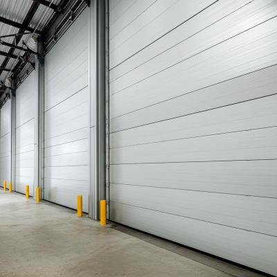 China Steel Commercial Sectional Overhead Doors Fire Station Industrial Sectional Doors Sectional Steel Doors Automatic Formed Wind Resistant for sale