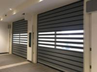 China Aluminum Alloy Industrial Automation Roll Up Door High Speed Spiral Door Safety Efficiency Wind Resistance 2.0knm2 Safety Efficiency for sale