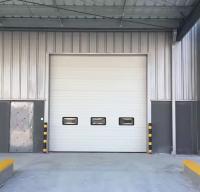 China High Speed 0.4m/s Insulated Sectional Overhead Door 42mm PU Sandwich Panel R-Value 13.73 Energy Efficient for sale