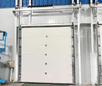 China Cold Storage Insulated Sectional Overhead Door SUS304 Steel Panel Beaufort 11 Wind Resistant EPDM Sealing System for sale