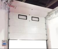 China Noise reducing commercial overhead Steel Industrial Sectional Doors Automatic Formed Professional Heavy-Duty Insulated for Warehouse & Factory for sale