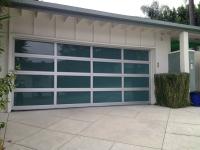 China Villa Use Frosted Aluminum Sectional Door Easy Installation Break Prevention for sale