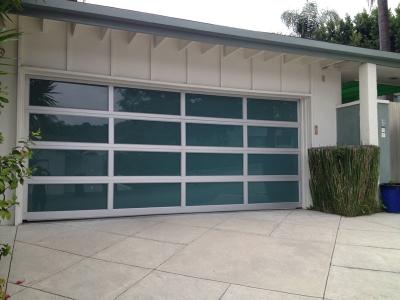 China Villa Use Frosted Aluminum Sectional Door Easy Installation Break Prevention for sale