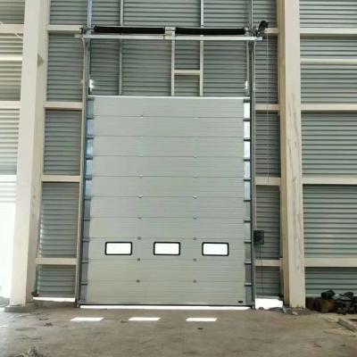 China Panel 40mm Sectional Overhead Door With Anti Breaking System for sale