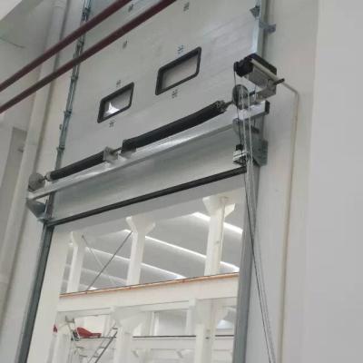 China Logistic Park Vertical Lift 80mm Overhead Sectional Door for sale