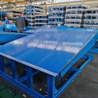China 25000LBS Push Button Hydraulic Loading Dock Leveler Anti Skid Security Checkered Plate for sale