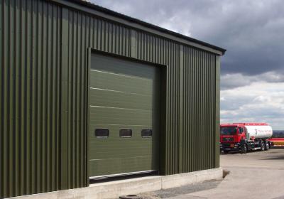 China Logistic Heavy Duty 8000mm Length Industrial  Overhead Sectional Door Applicable temperature -40℃-50℃ for sale