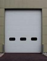China Industrial Warehouse 2.0mm Aluminum Alloy Insulated Sectional Doors for sale