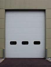 China Industrial Warehouse 2.0mm Aluminum Alloy Insulated Sectional Doors for sale