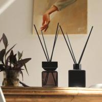 China Luxury Customised Floral Reed Diffuser Square Black Glass Bottle Perfume With Box for sale