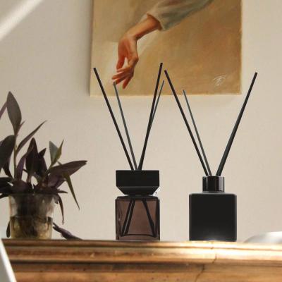 China Luxury Customised Floral Reed Diffuser Square Black Glass Bottle Perfume With Box for sale