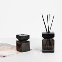 China Luxury Customised Floral Reed Diffuser Square Black Glass Bottle Perfume With Box for sale