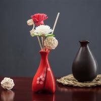 China Hotel Fragrance Air Fresher Flower Stick Ceramic Bottle Decorative Aroma Reed Diffuser for sale