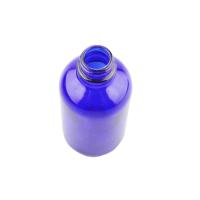 China Liquid Medicine Blue 2oz Boston Round Glass Bottles for sale