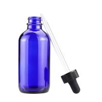 China Liquid Medicine Blue 2oz Boston Round Glass Bottles for sale