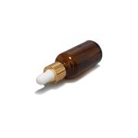 China Eco Friendly 30ml Essential Oil Glass Bottles Phenolic Caps for sale