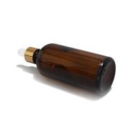 China 100ml Amber Essential Oil Glass Bottles DIN18 Size With Golden Cap for sale