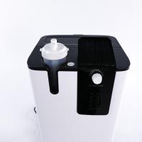 China HD Display White Medical Oxygen Concentrator 5 L/min With Cardan Wheel Rotates Freely for sale