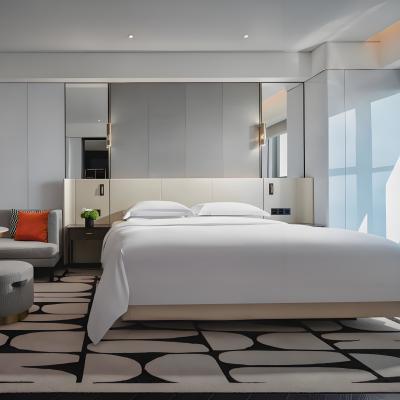 China Luxury Hotel Guest Room Furniture Set Hardwood Frame with High Density 40-45D Foam for sale