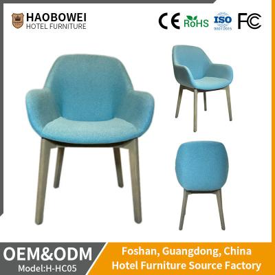 China Curved Backrest Solid Wood Armchair Blue Upholstered Fabric Dining Chair 620mm for sale