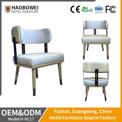 China Luxury Leather Upholstered Hotel Dining Chair 565mm 790mm Ash Wood Frame ODM for sale