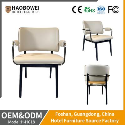 China Armed Tufted Leather Hotel Dining Chair 650mm 820mm Ash Wood Frame for sale