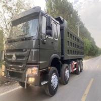 China Tubeless Tire Design HOWO 8X2 Dump Truck for 15000kg Loading Capacity Wood Transport for sale