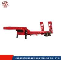 China Grade Heavy Duty 3 Axle Low Flatbed Semi Trailer Chassis for Container Transport for sale