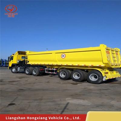 China Flatbed Heavy Duty 13500X3000X1550 mm Tractor Hydraulic End Rear Tipper Dump Semi Trailer for sale