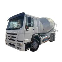China Sinotruck Concrete Mixer Truck with Right Hand Drive Steering System and 4 Axle for sale