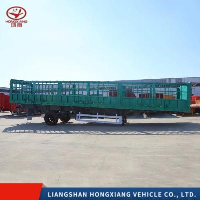 China Stable Yuetong Cargo Transport Truck with Side Wall Fence Customisable Semi Trailer for sale