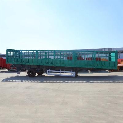 China 100 Ton 3axle Stable Cargo Transport Truck With Side Wall Fence Customisable Semi Trailer for sale