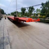 China Truck Trailer Flatbed Trailer 3 Axles Container Carrier Truck 60tons 13m Tire 12r22.5 for sale