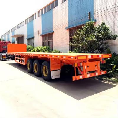China Low Bed Semi Trailer Direct Trailing Arm Type Telescopic Low Flatbed Truck Trailer for sale