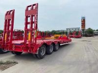 China 60ton 20FT Flat Bed Container 40FT Flatbed Semi Truck Trailer with High Load Capacity for sale