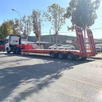 China Low Bed Truck Trailer Lowboy Flatbed Truck Iron Tread 1820mm Heavy Duty 3 Axles 100t for sale