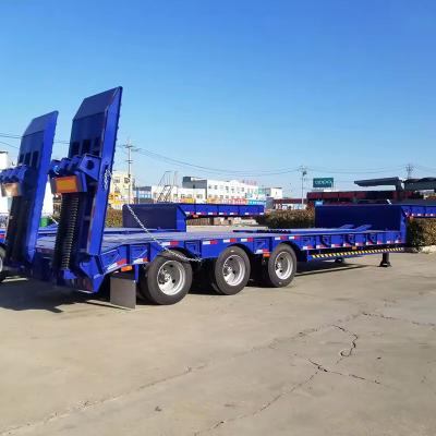 China Heavy Duty Equipment Transport Lowboy 100 Ton 4 Axles Lowbed Semi Trailer with Iron Body for sale