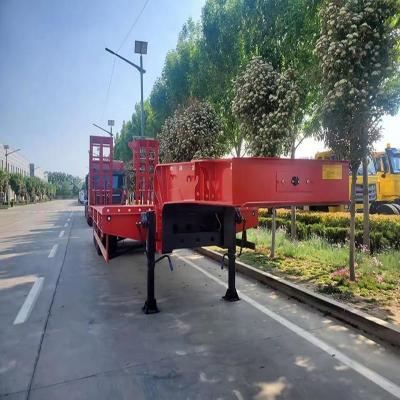 China Manual Landing Leg 60 Tons Heavy Duty Low Bed Truck Trailer for 40FT Container Carrier for sale