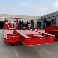 China 12r22.5 Tire 3 Axles 4 Axles Container Semi Trailer 40hq Flatbed Cargo Semi Trailer for sale