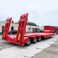 China 13500X3000X1550 mm Iron Lowbed Semi Trailer for Machinery Transport 13m Flatbed Trailer for sale