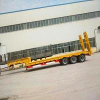 China Lowbed Smei Trailer 3 Axle Flatbed Semi Trailer Tread 1820mm Grade Heavy Duty for sale