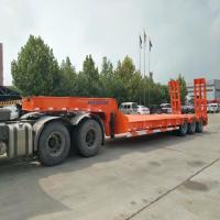 China Lowbed Smei Trailer 3 Axle Flatbed Semi Trailer Tread 1820mm Grade Heavy Duty for sale