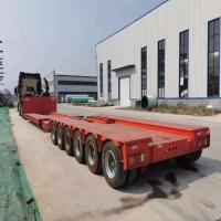 China Heavy Duty 3 Axles Low Bed Lowboy Flatbed Semi Trailer Truck with Hydraulic Lift and Gooseneck for sale