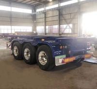China Flatbed 3-Axle 20- and 40-Foot Dock Container Skeleton Truck Trailer for Long-Lasting for sale