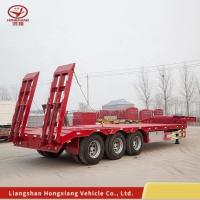 China Q345b / T700 Steel Main Beam 3/4 Axle Low Bed Truck Trailer for Heavy Duty Machinery for sale